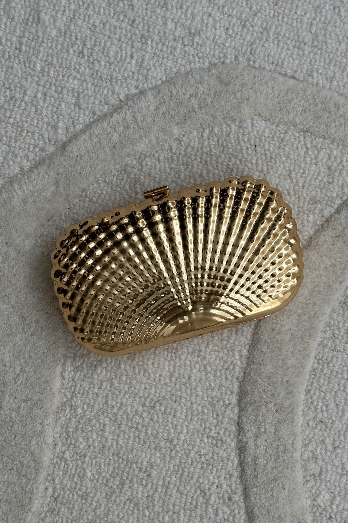 Shell-shaped metal clutch curated on LTK