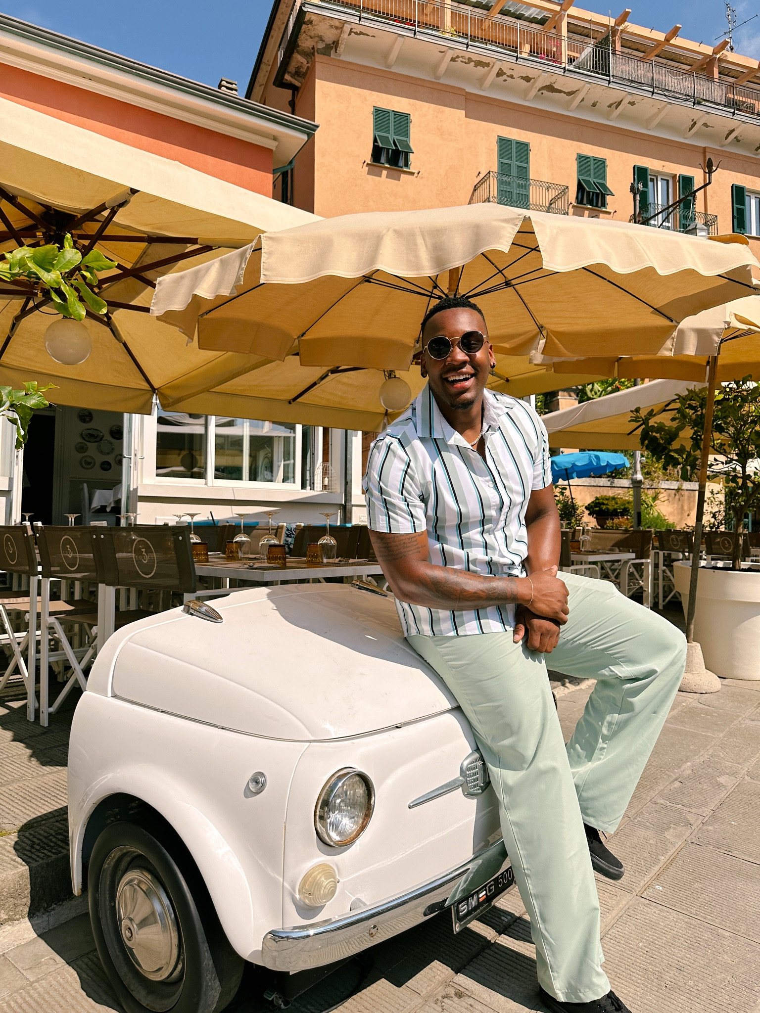 5 Cool Vacation Outfits for Men Thatll Keep You Stylish on Your Getaway ...